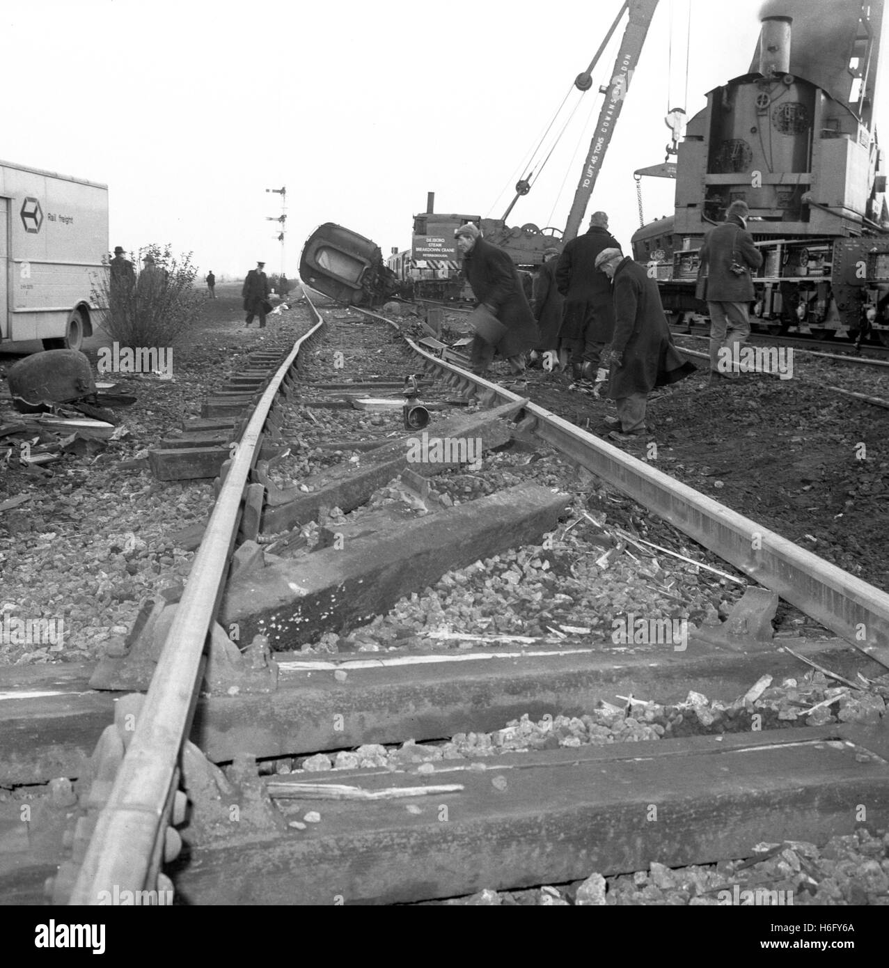 Sleepers on the slow line torn up after the derailment of the speeding ...