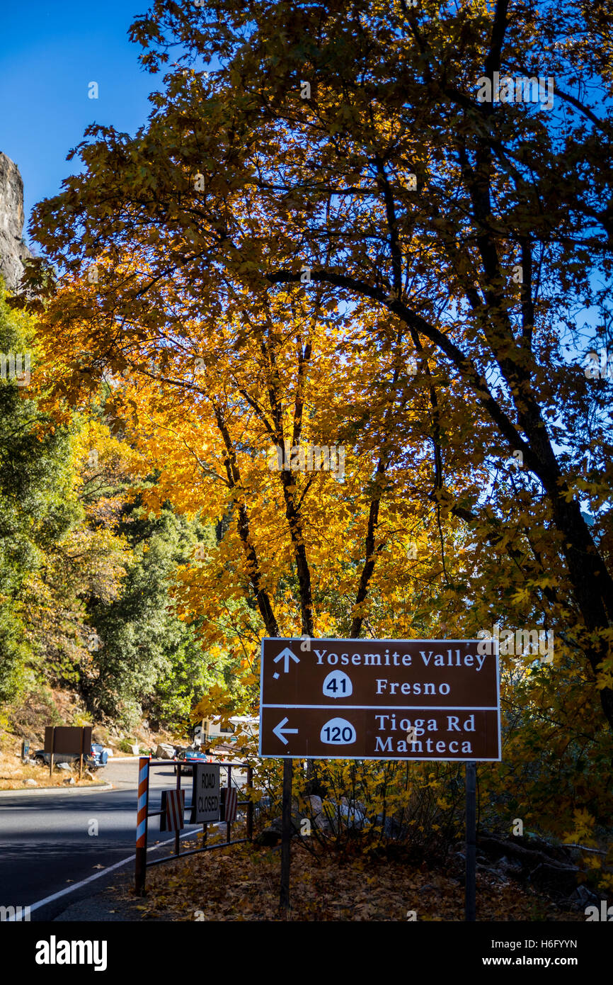 A sign giving directions in Yosemite National Park California USA in ...