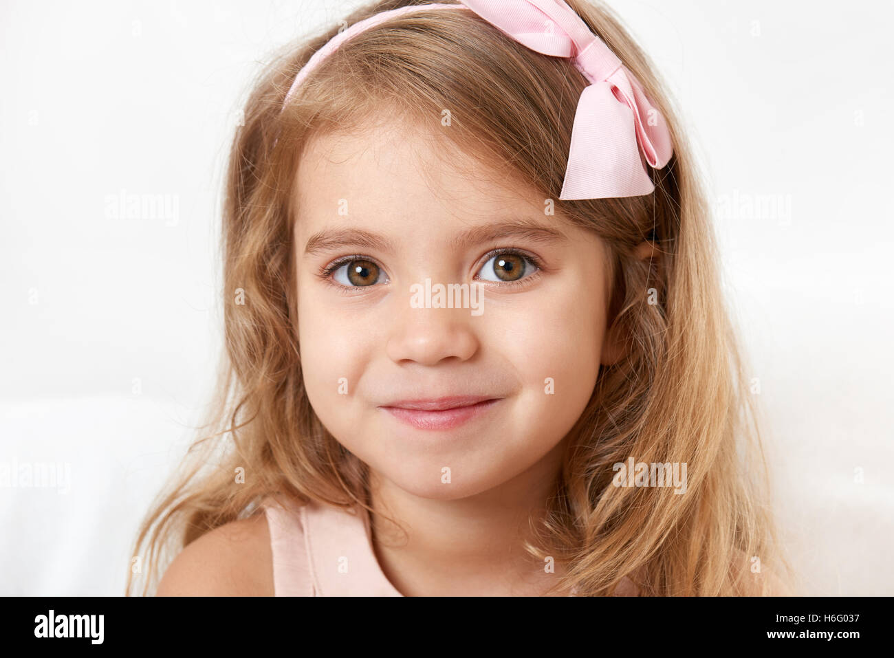 Adorable little child girl face closeup portrait Stock Photo - Alamy