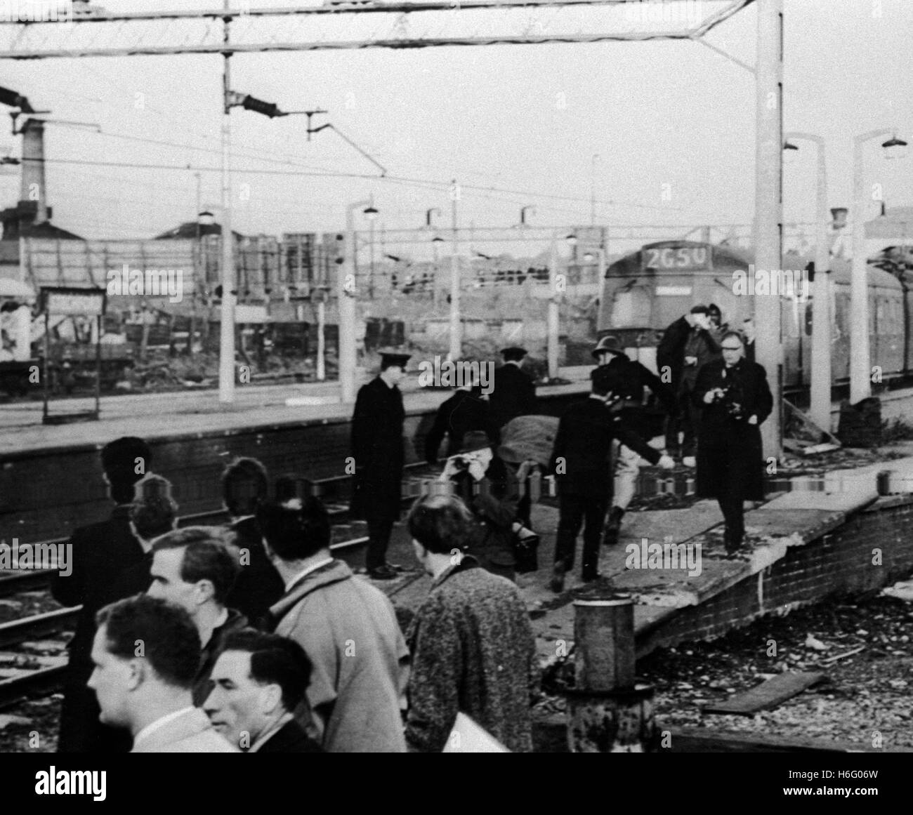 Firemen carry a victim in the rail crash at Stechford railway station ...