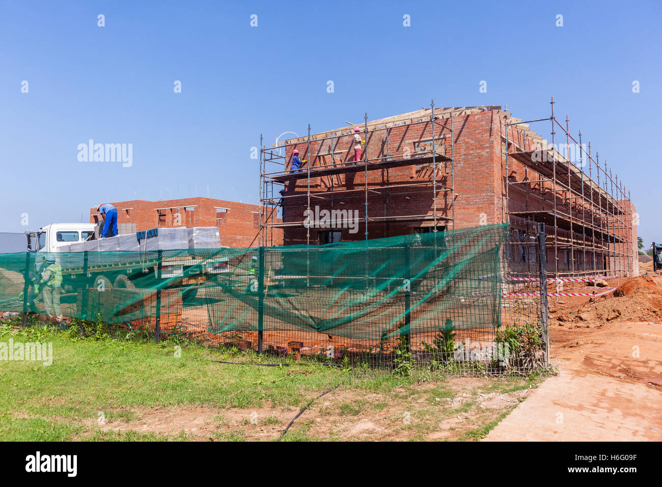 Building construction halfway photo progress of brick work roof ...