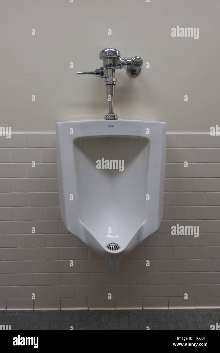 Urinal in a public mens restroom Stock Photo - Alamy