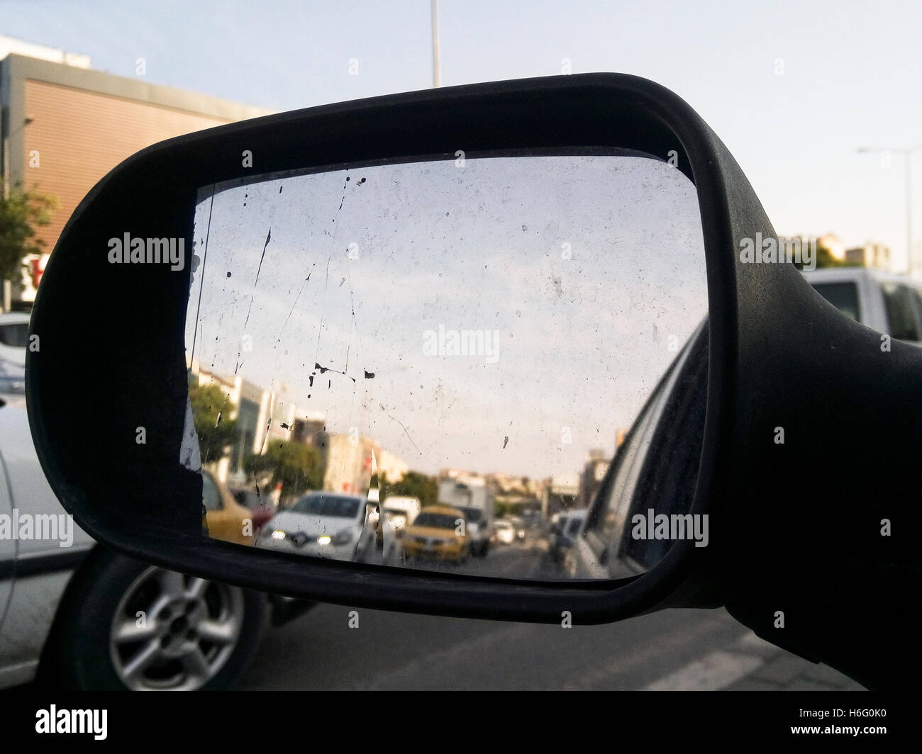 Broken rearview mirror and defocused traffic Stock Photo - Alamy