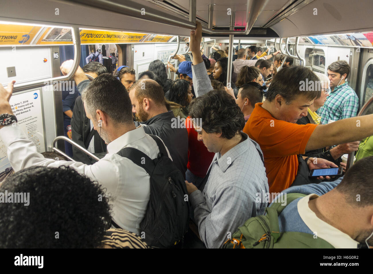 Morning rush hour on the F subway line from Brooklyn to Manhattan can ...