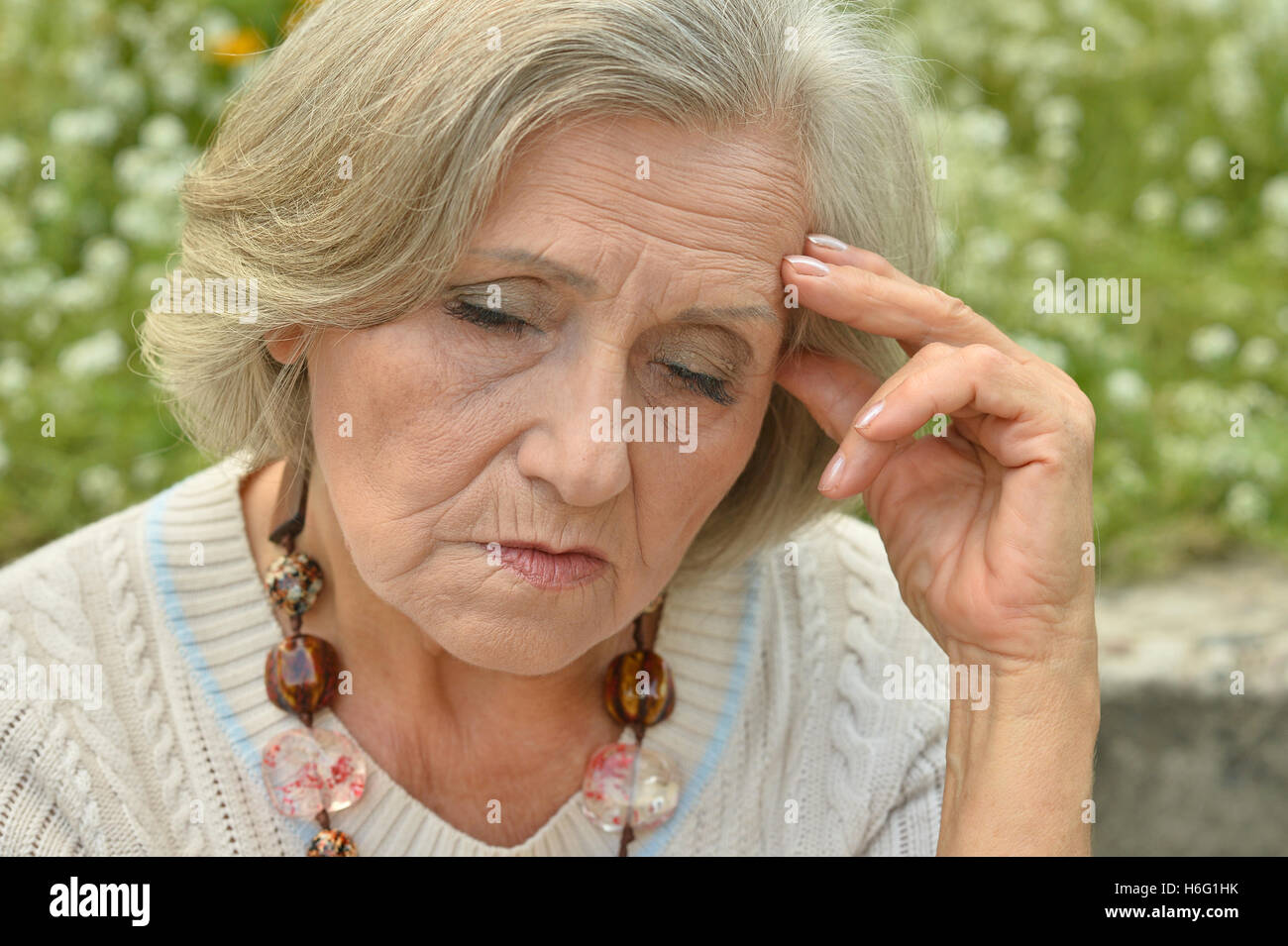 Nice sad old woman Stock Photo - Alamy
