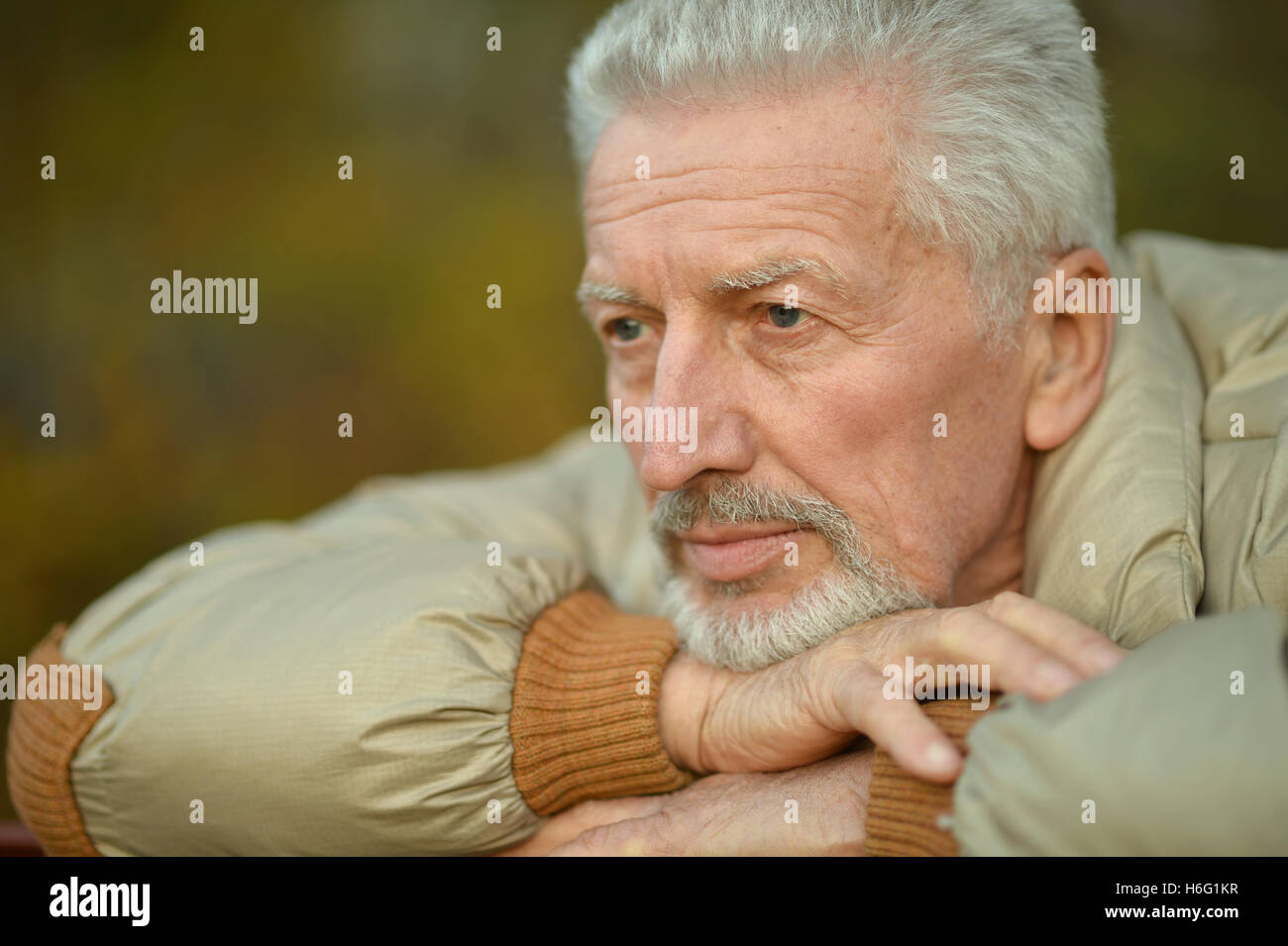 Senior man thinking Stock Photo - Alamy
