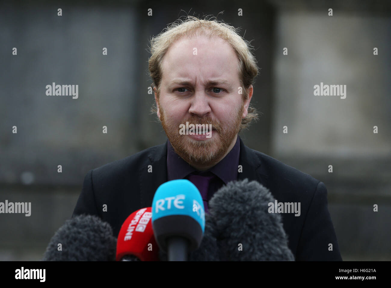 Green Party leader Steven Agnew speaks outside the High Court in ...