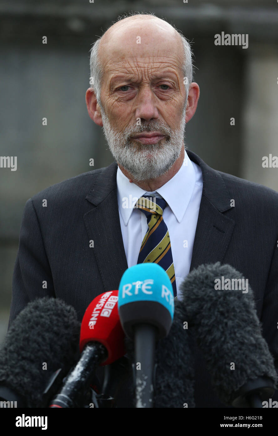 David Ford of the Alliance Party speaks outside the High Court in ...