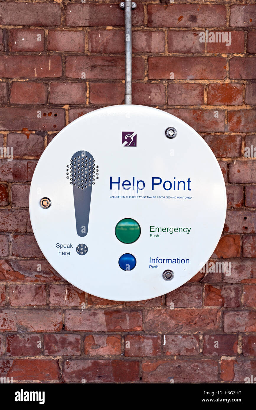 Help point on the wall of an overground railway station platform Stock ...