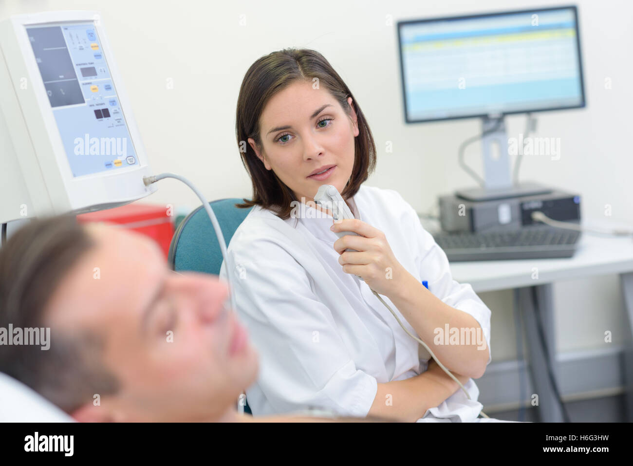 Nurse looking pitifully at patient Stock Photo - Alamy
