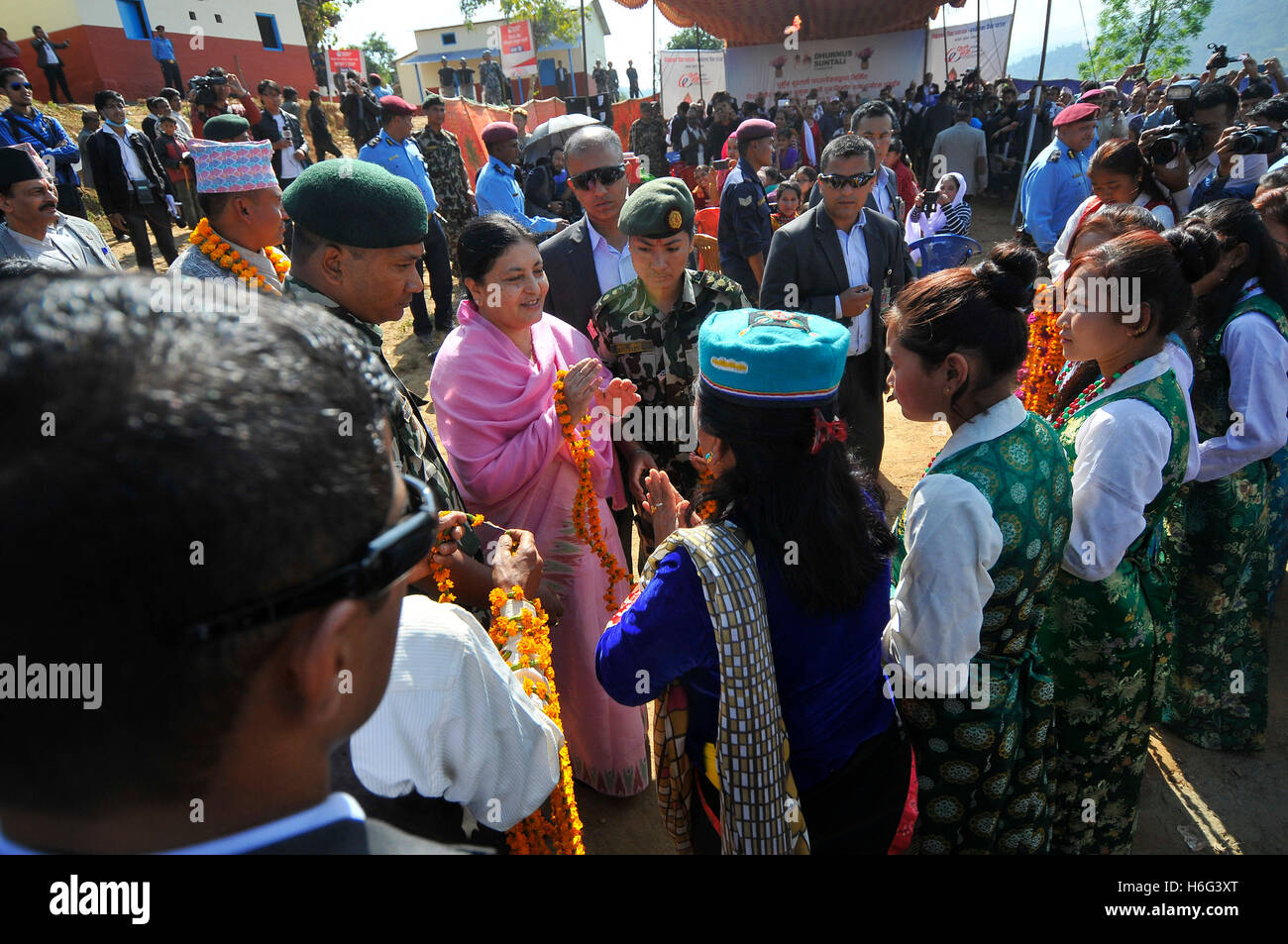 Sindhupalchowk, Nepal. 28th Oct, 2016. Nepalese people offering flower ...