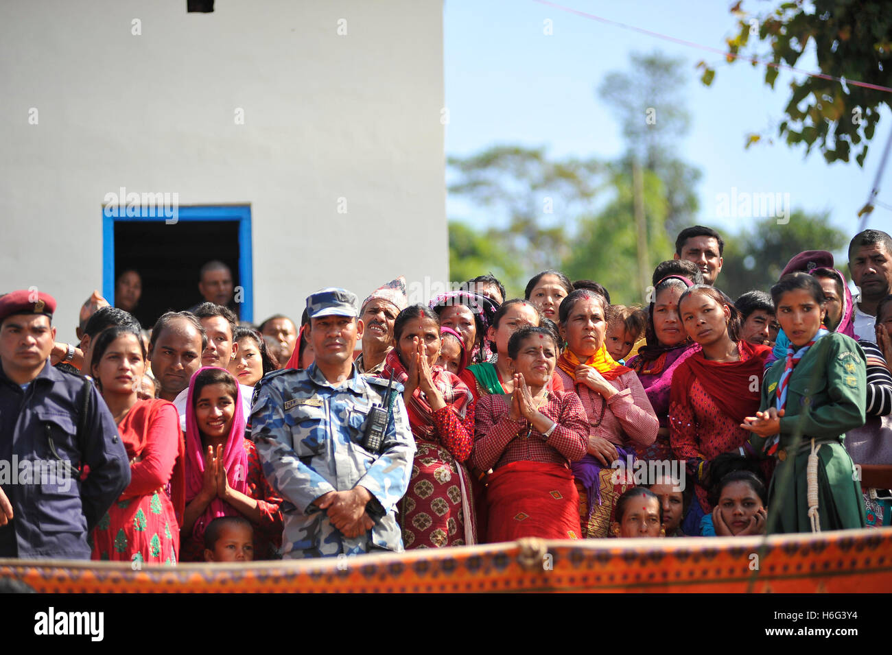 Nepalese people observing handed over the integrated model settlement ...