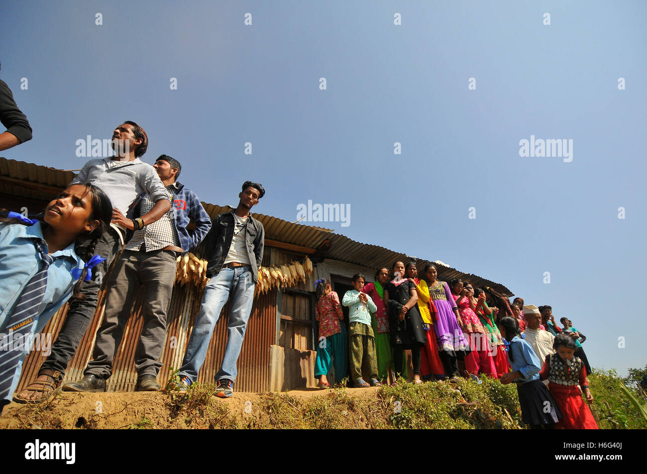 Sindhupalchowk, Nepal. 28th Oct, 2016. Nepalese people glancing flying ...