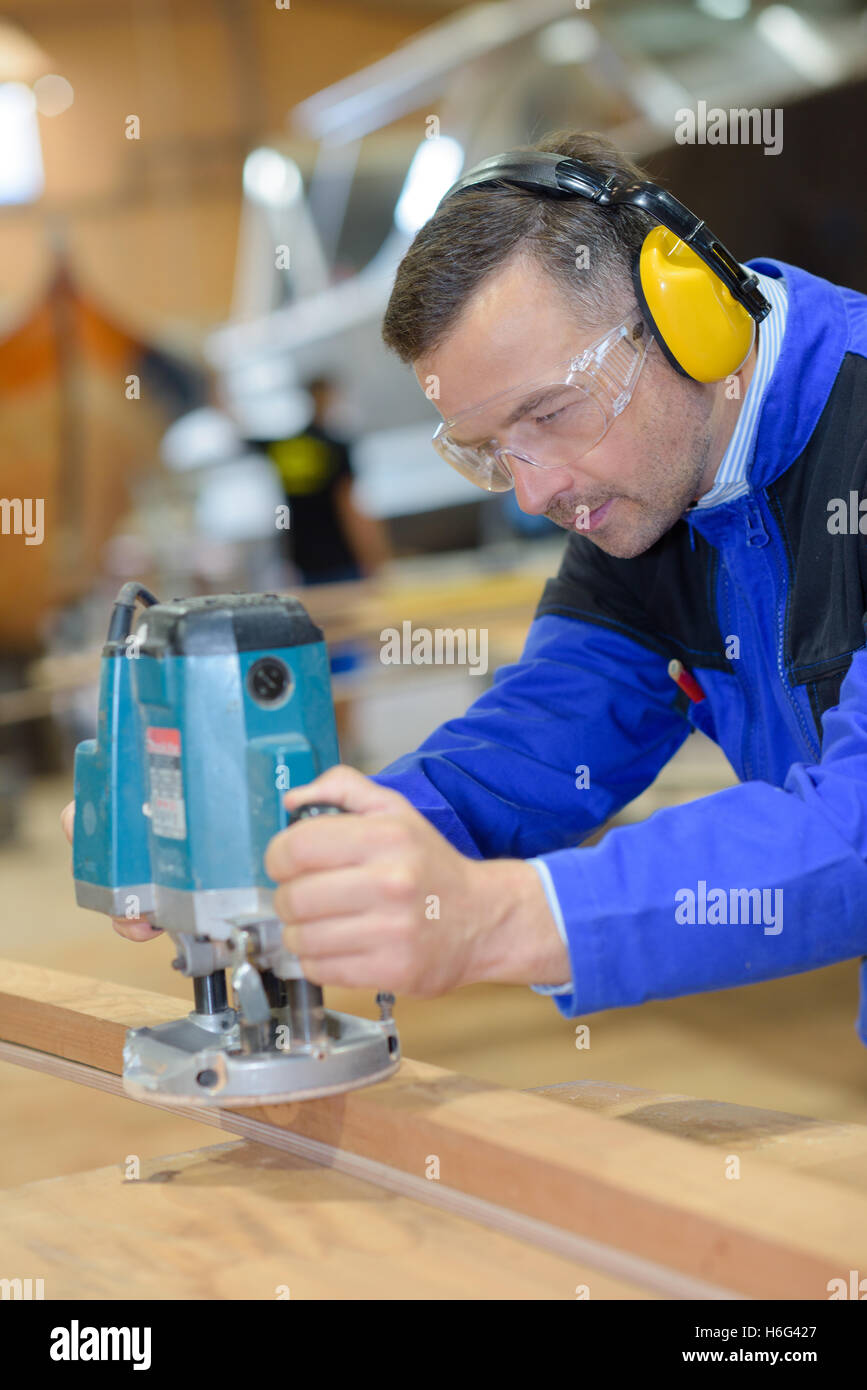 Man using router Stock Photo - Alamy