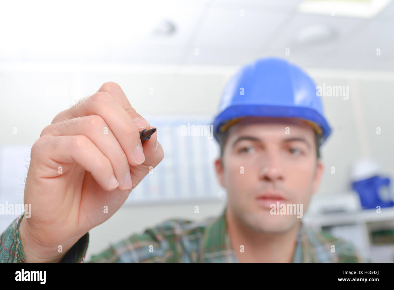Going over plans together Stock Photo - Alamy