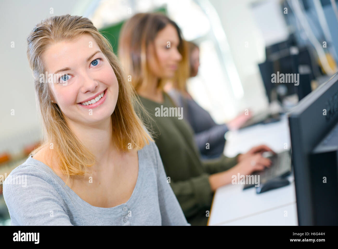 Female student in computer class Stock Photo - Alamy