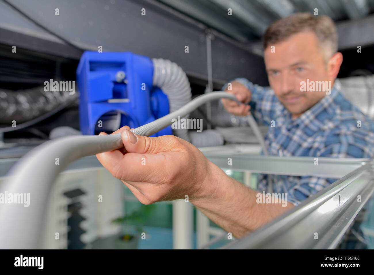Electrician with conduit hi-res stock photography and images - Alamy