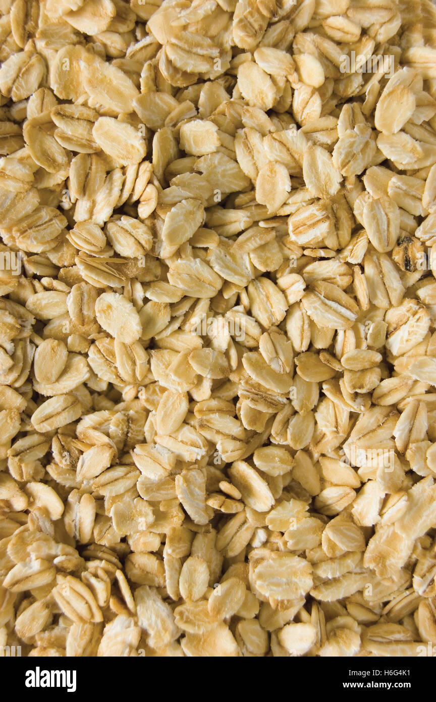 Oatmeal background, rolled raw oats texture, detailed textured vertical ...