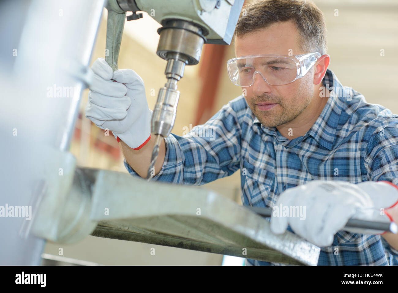 man with a steel driller Stock Photo - Alamy