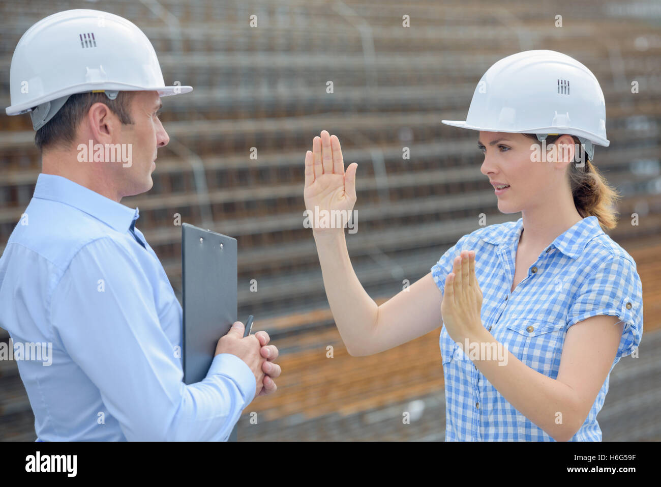 Woman showing measurement with hands Stock Photo - Alamy