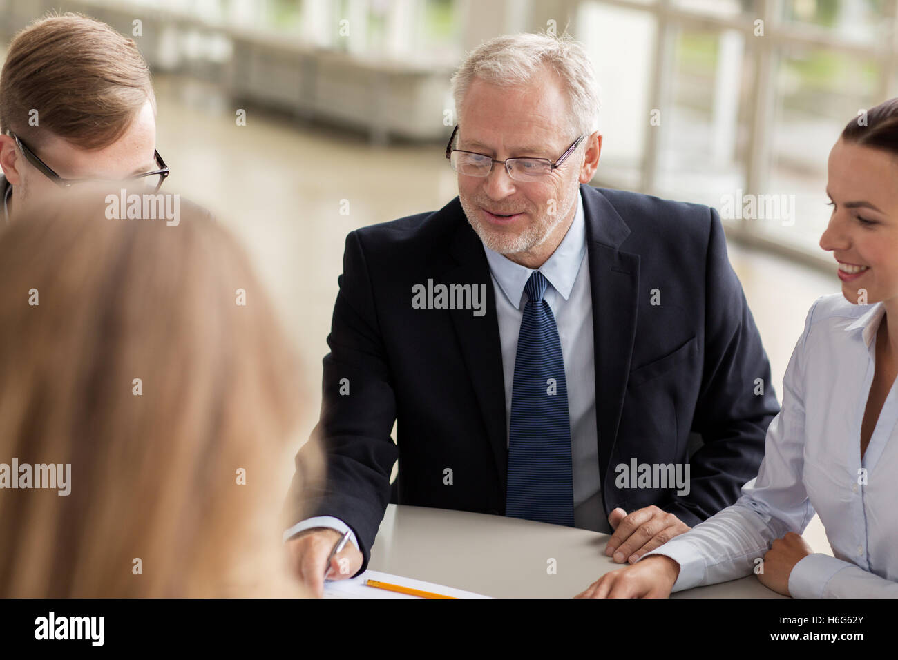 smiling business people meeting in office Stock Photo - Alamy