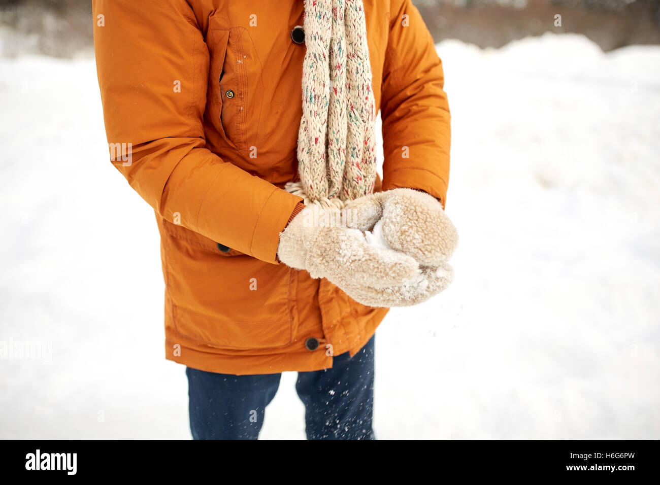 Man making snowball hi-res stock photography and images - Alamy