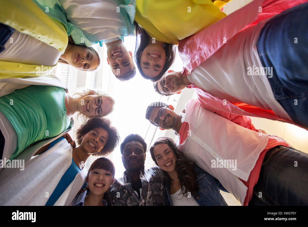 group of international students standing in circle Stock Photo - Alamy