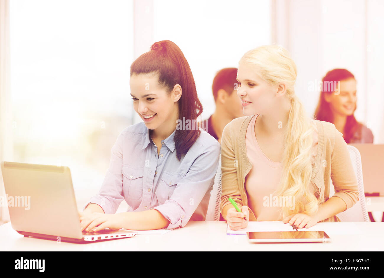 students with laptop, tablet pc and notebooks Stock Photo - Alamy