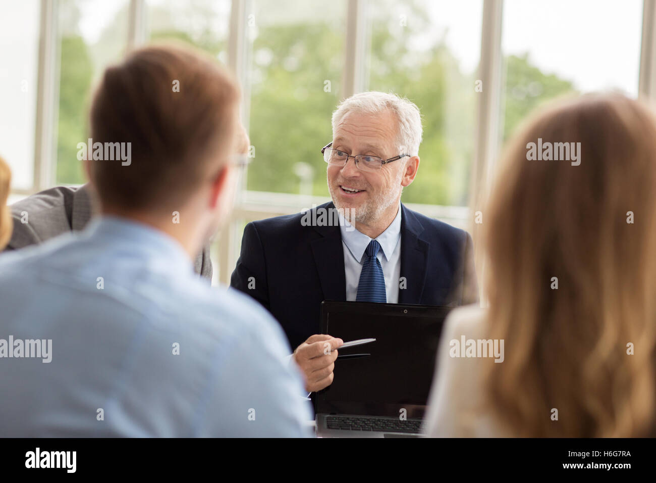business people with laptop meeting in office Stock Photo - Alamy
