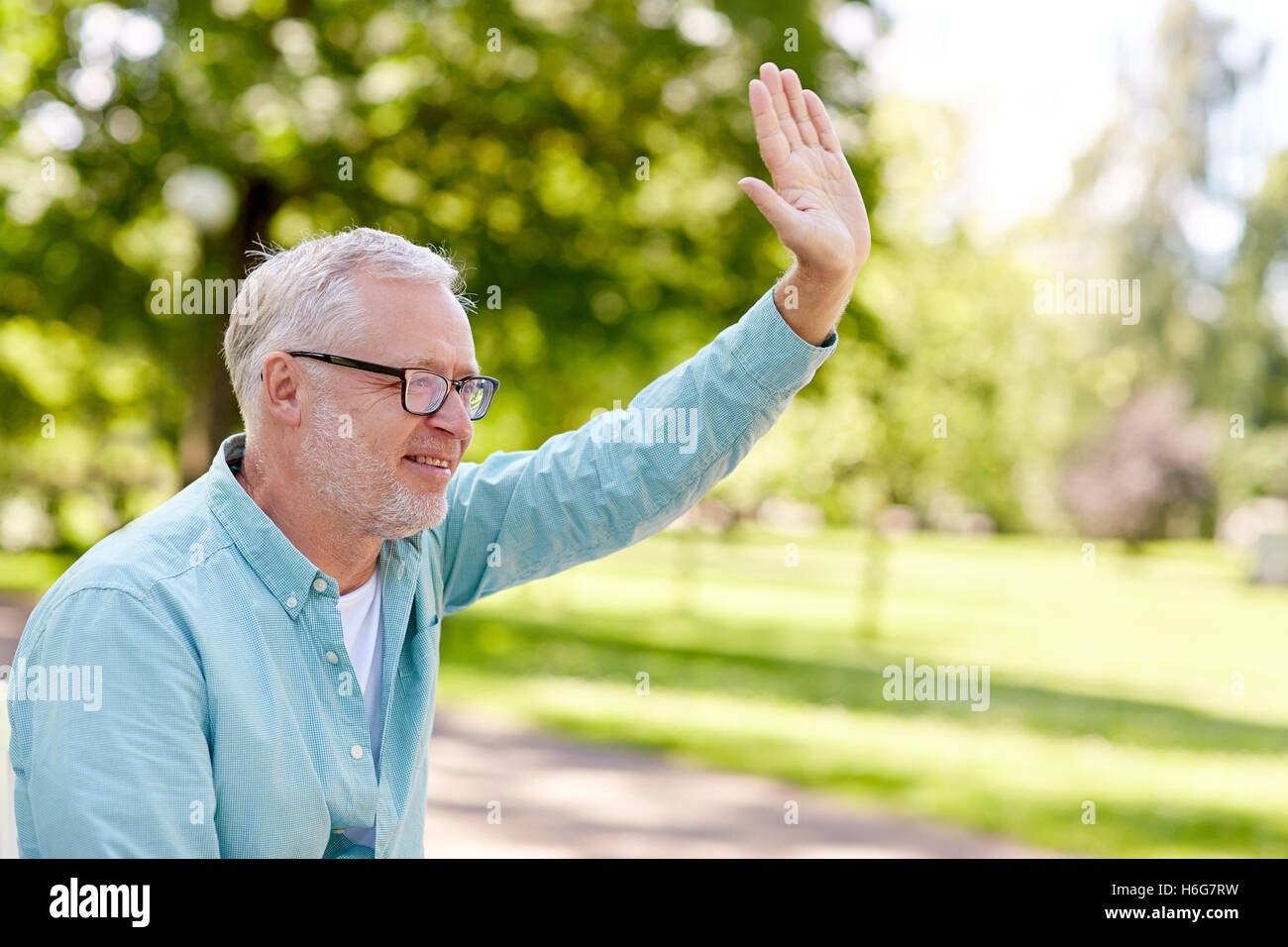 Old man waving hi-res stock photography and images - Alamy
