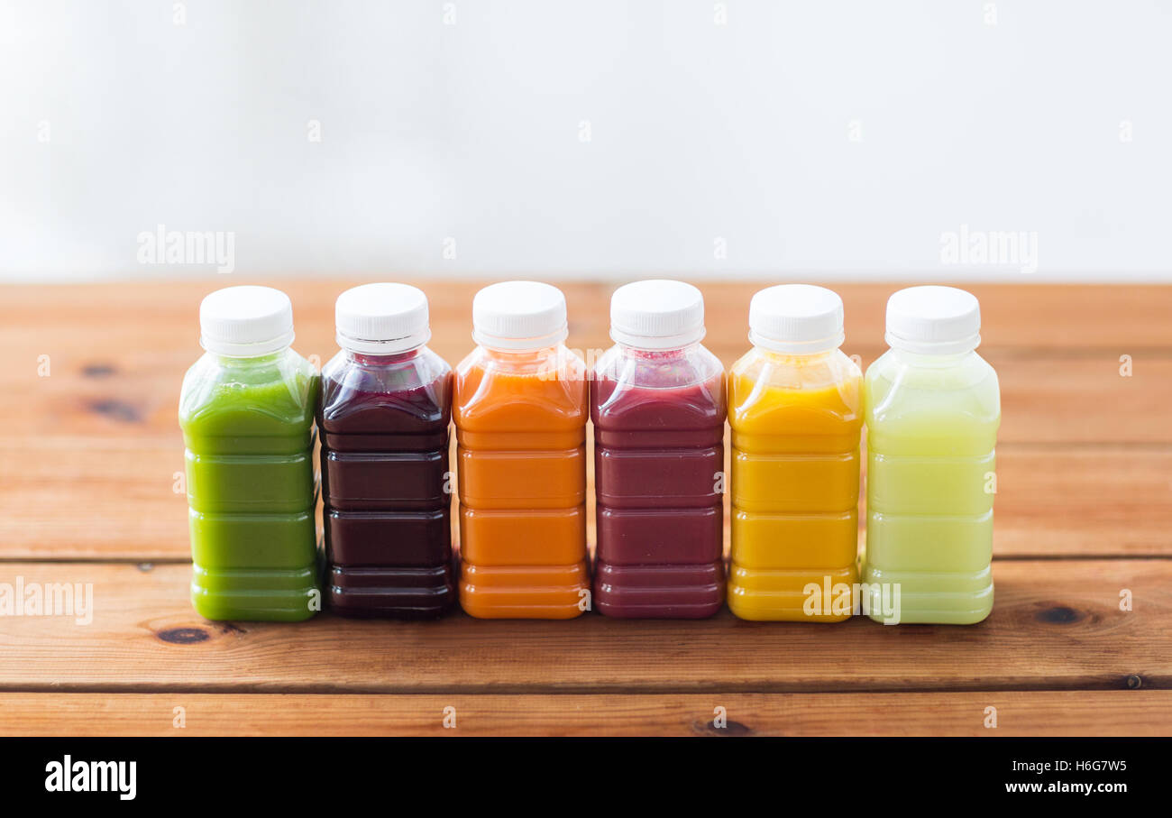 bottles with different fruit or vegetable juices Stock Photo - Alamy