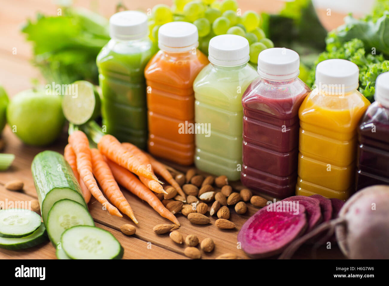 bottles with different fruit or vegetable juices Stock Photo - Alamy