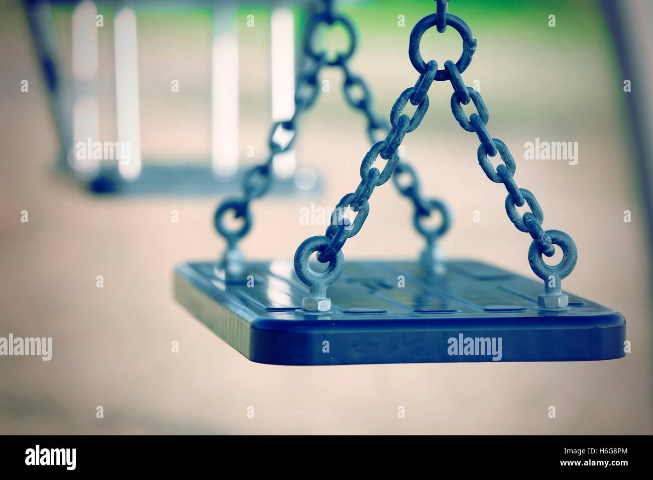 view of a double swing from a lateral perspective Stock Photo - Alamy