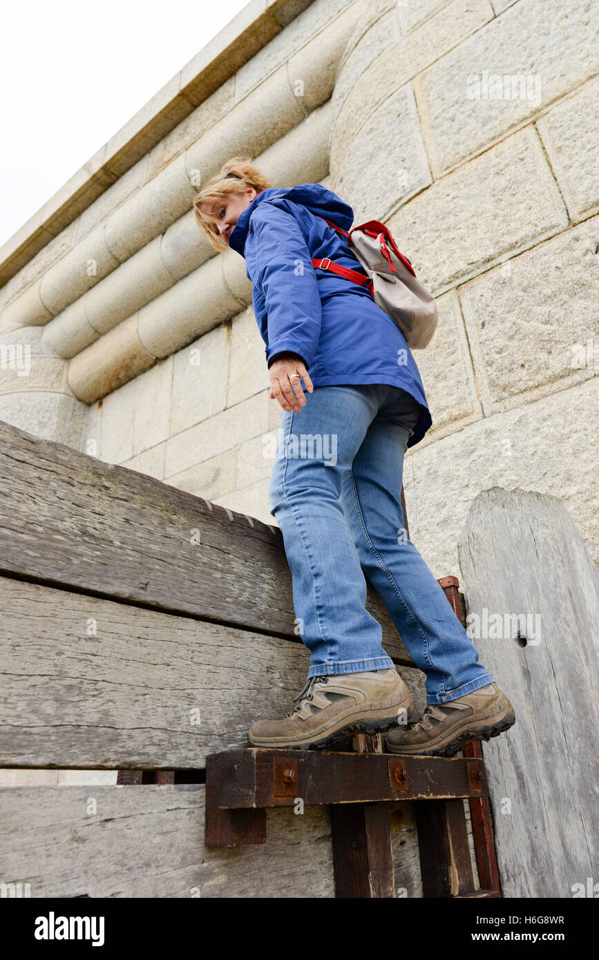 Climbing over fence hi-res stock photography and images - Alamy