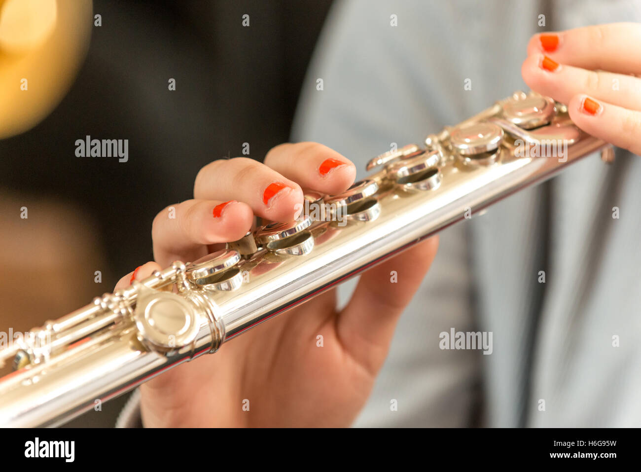 Close-up details of musical instruments being played Stock Photo - Alamy