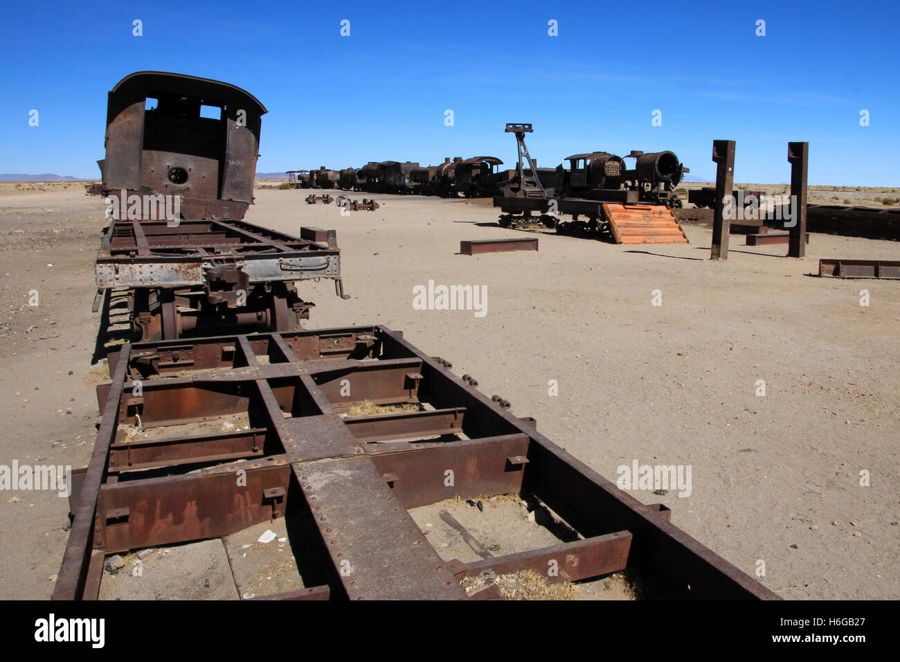 Graveyard of rusty old trains in Uyuni, Bolivia Stock Photo - Alamy