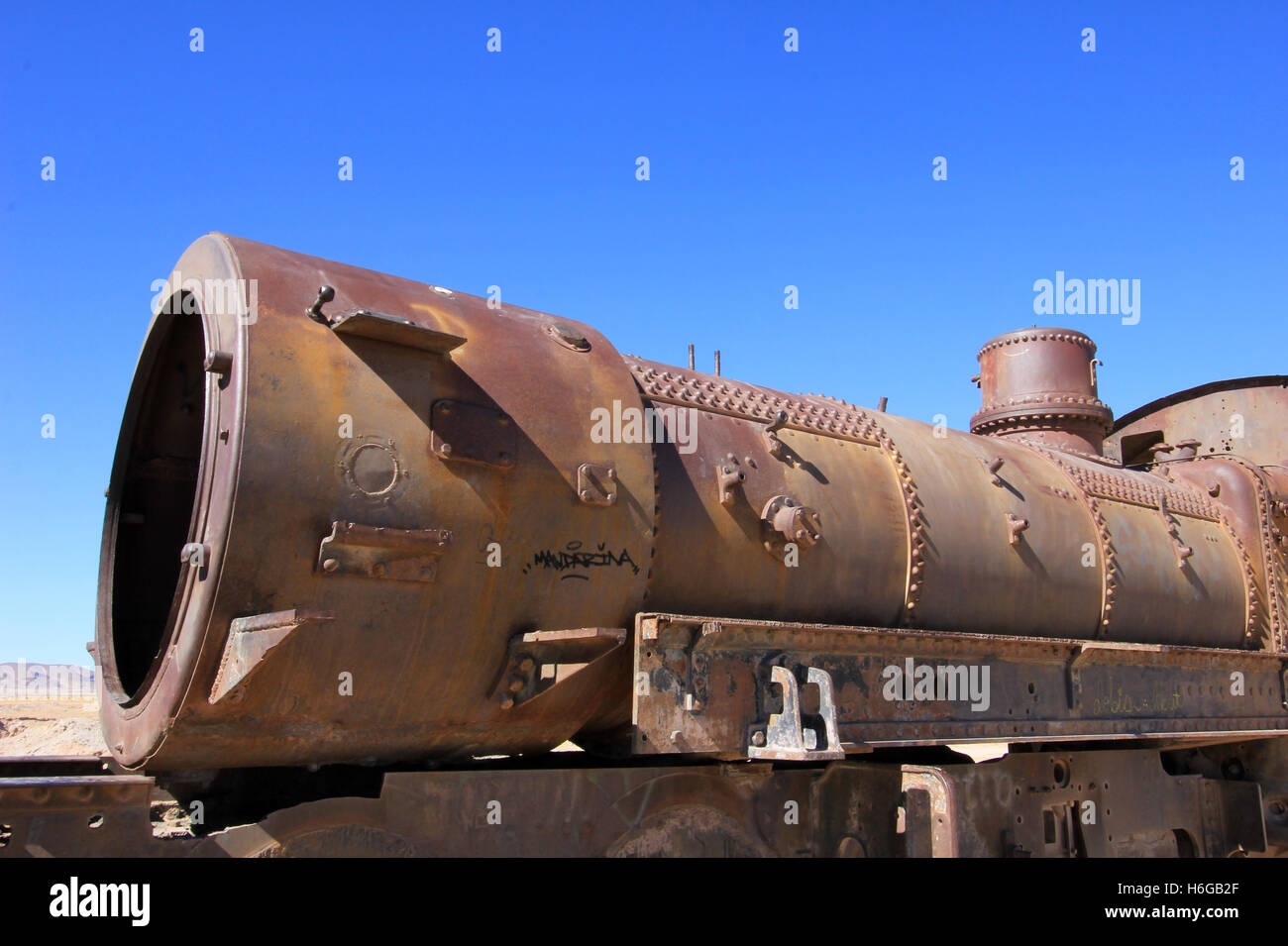 Graveyard of rusty old trains in Uyuni, Bolivia Stock Photo - Alamy