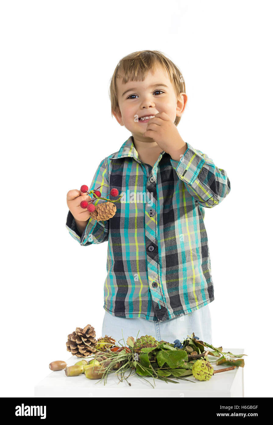 Two years boy learning nature through playing Stock Photo - Alamy