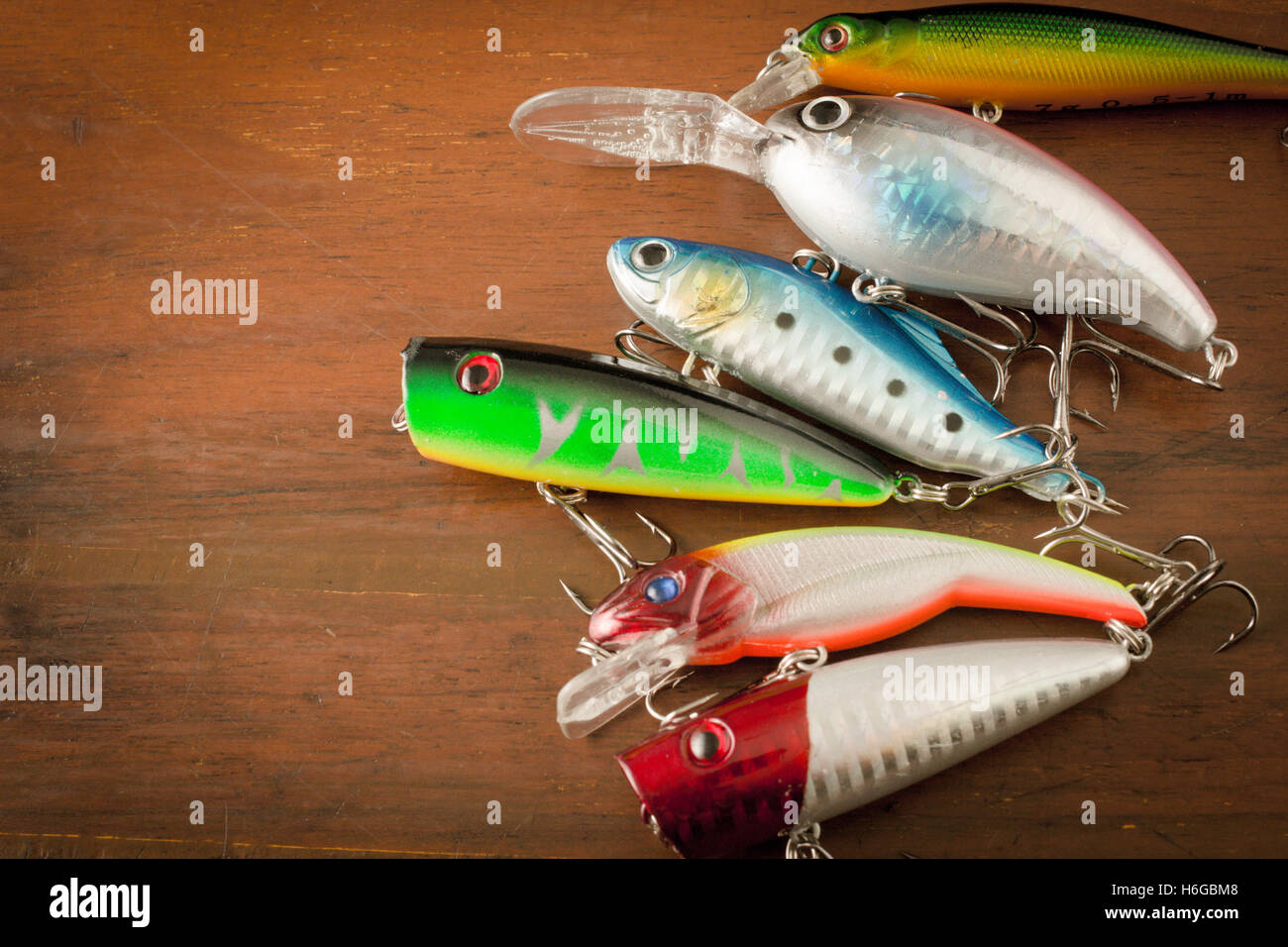 Set of Fishing Lure on wood table with copy space Stock Photo - Alamy