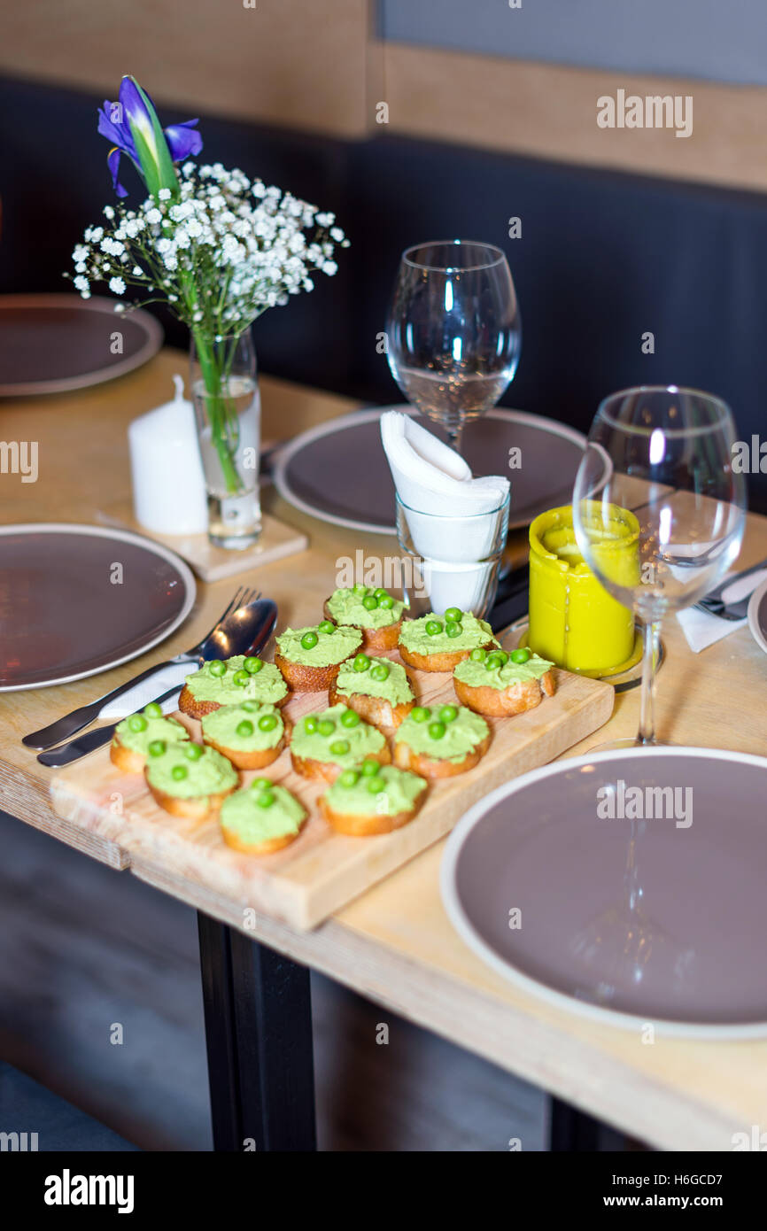 Decorated table ready for dinner. Beautifully decorated table set with ...