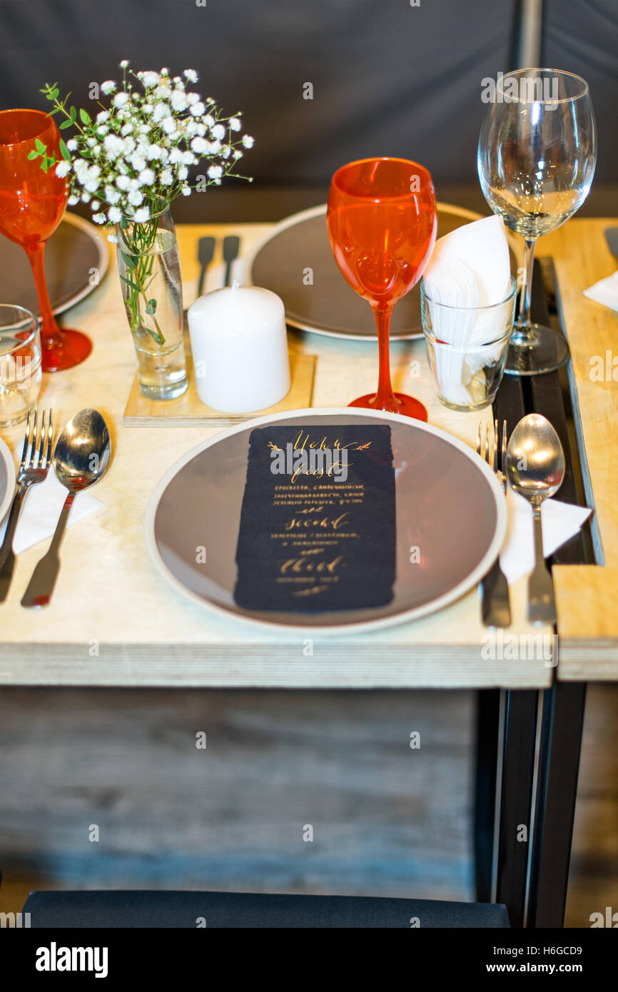 Decorated table ready for dinner. Beautifully decorated table set with ...