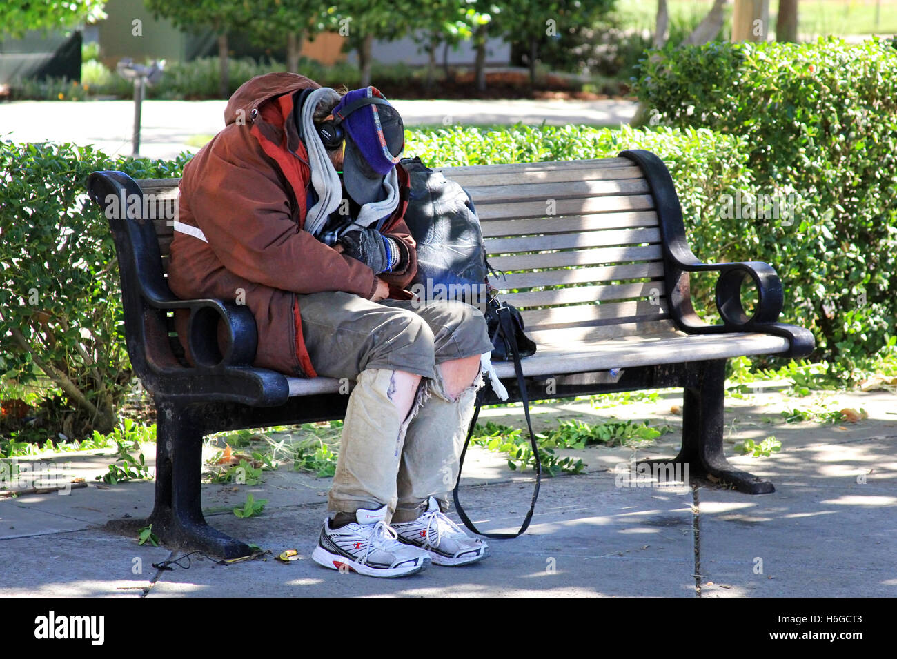 Homeless man sleeps on the street in the center of San Francisco Stock ...