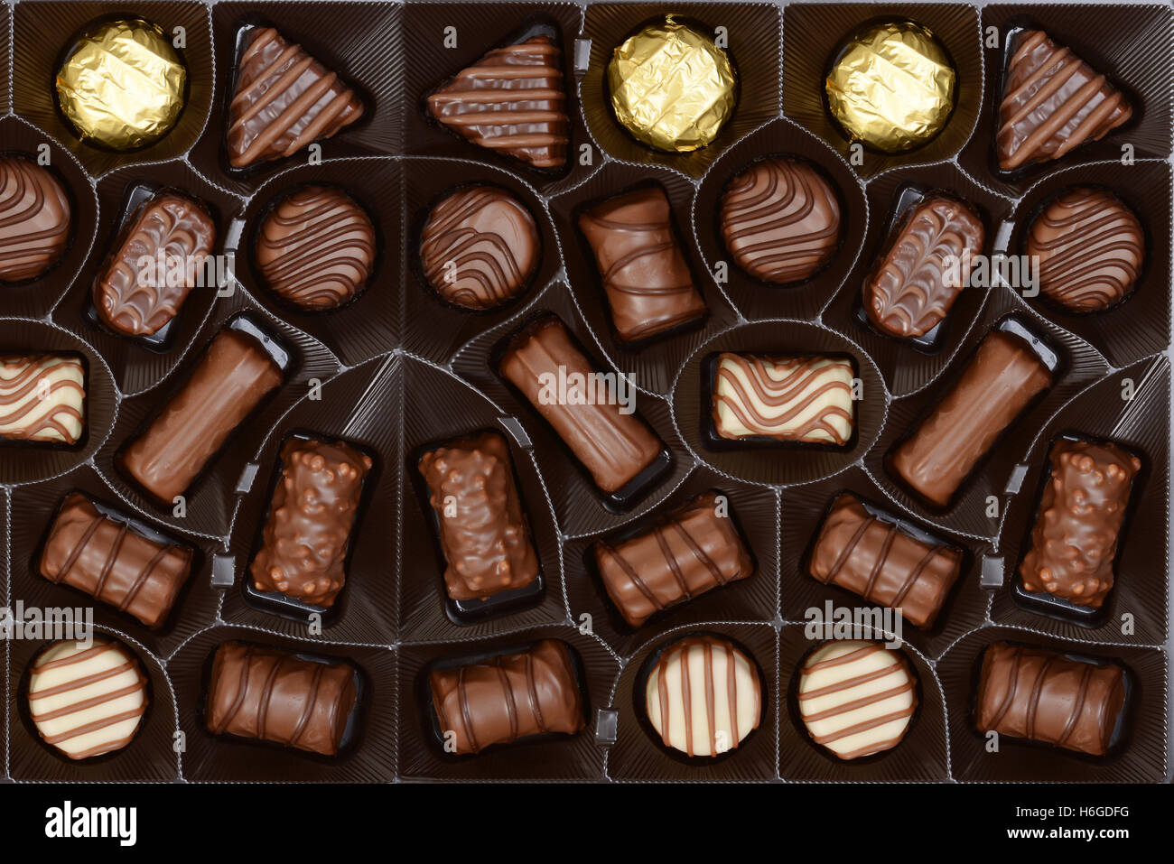 box of chocolates background Stock Photo - Alamy