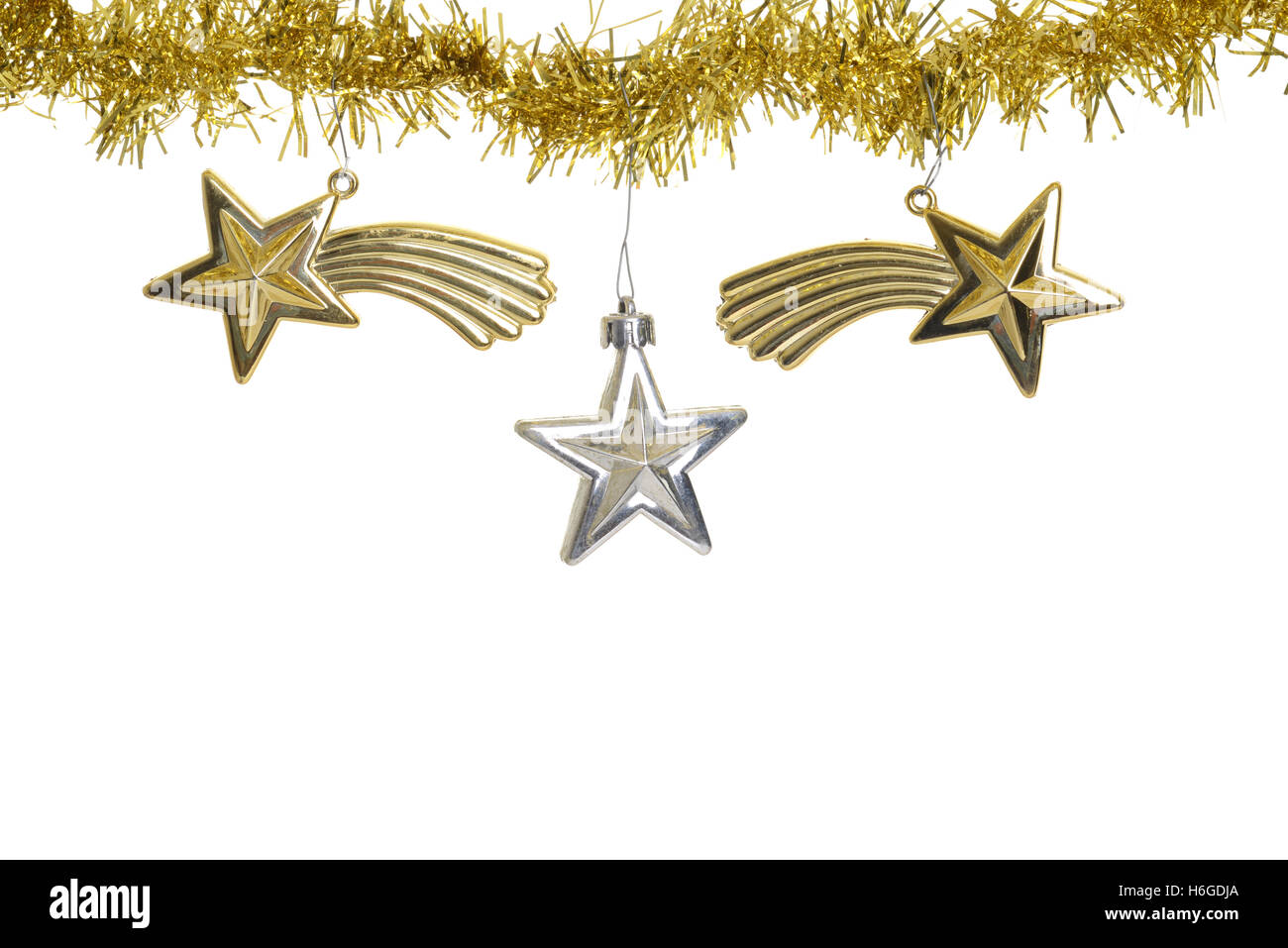three stars on Christmas gold garland Stock Photo - Alamy