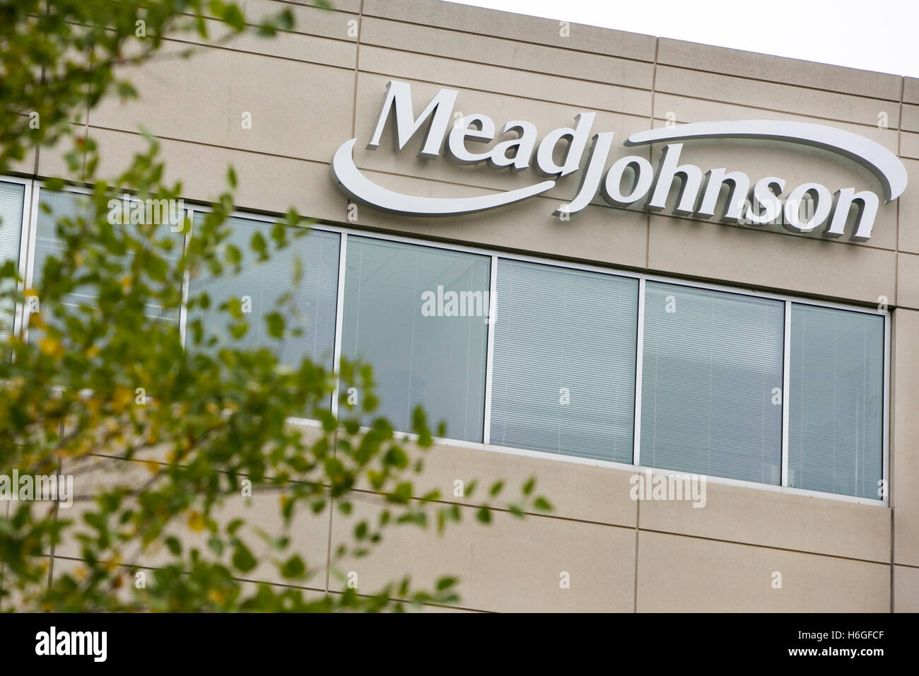 A logo sign outside of the headquarters of the Mead Johnson Nutrition ...