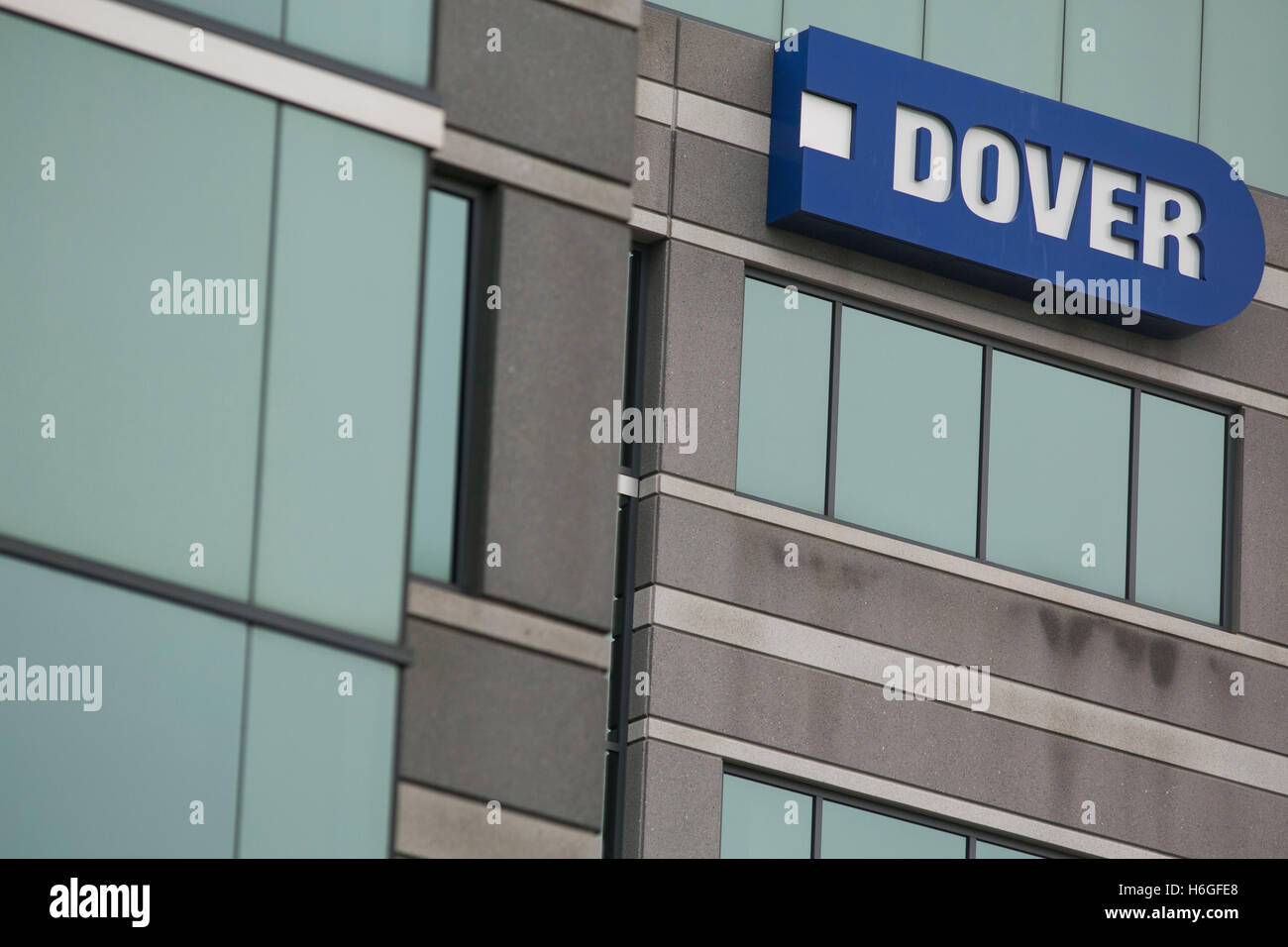 A logo sign outside of the headquarters of the Dover Corporation in ...