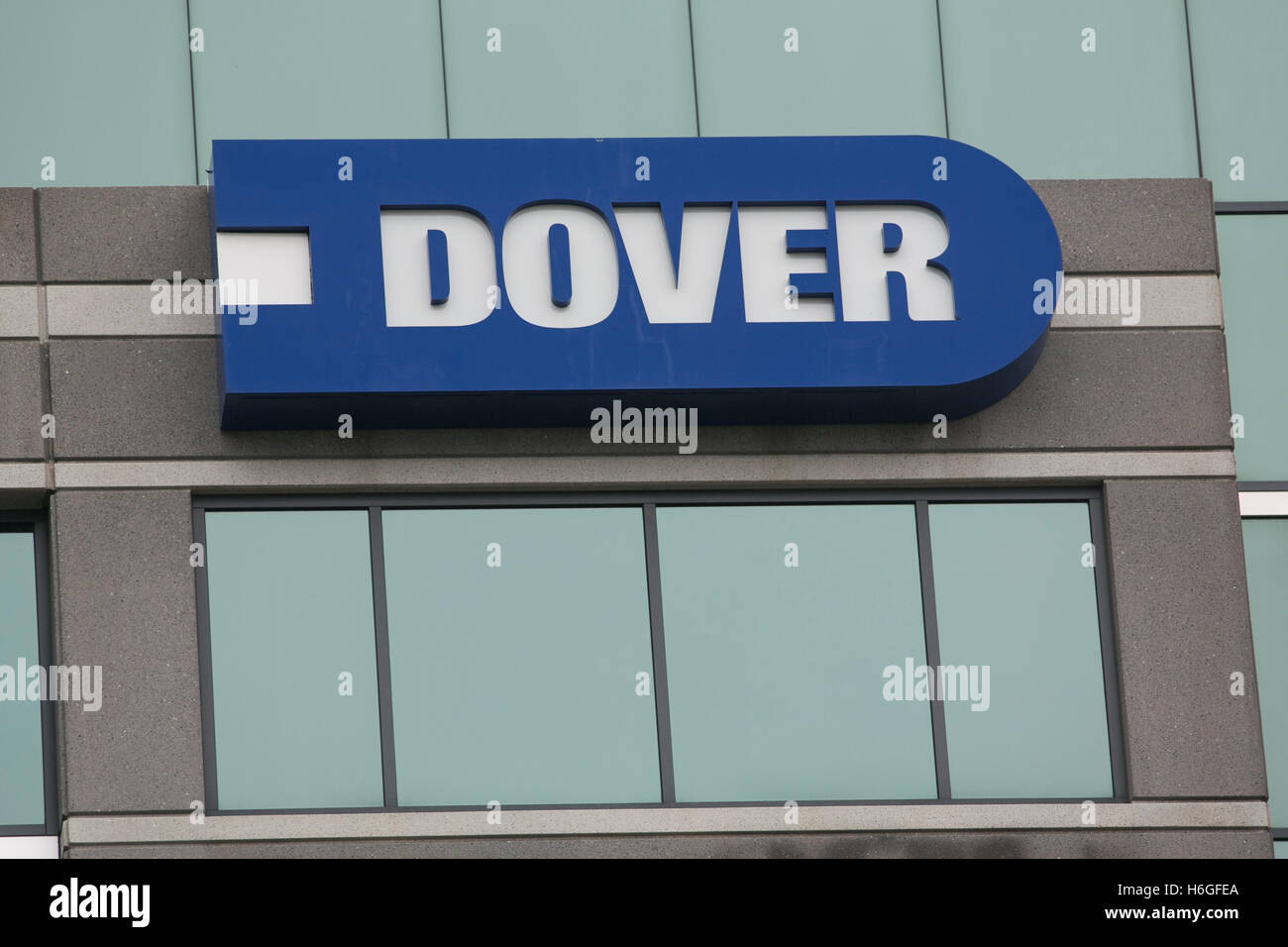 A logo sign outside of the headquarters of the Dover Corporation in ...