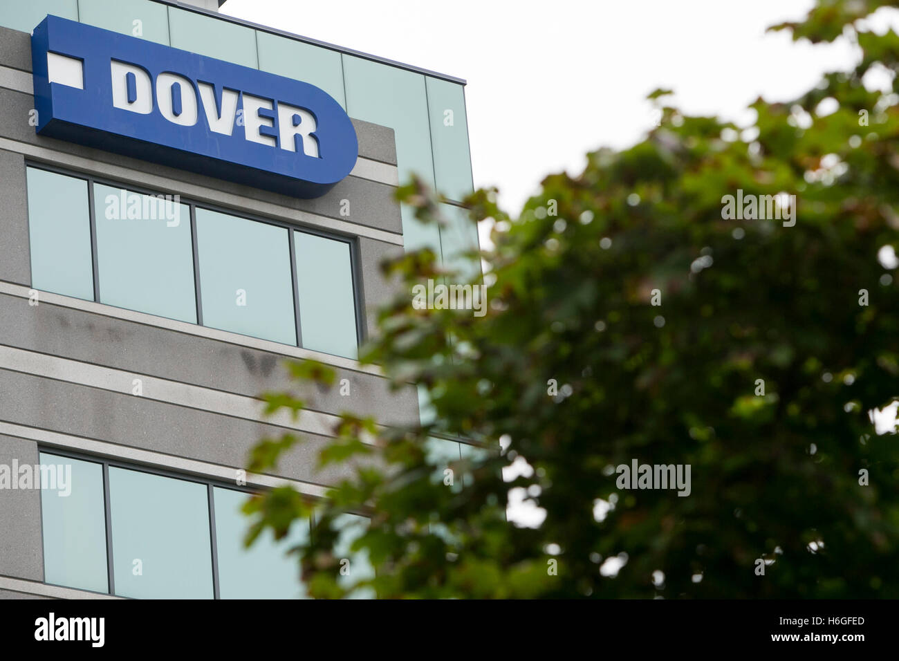 A logo sign outside of the headquarters of the Dover Corporation in ...