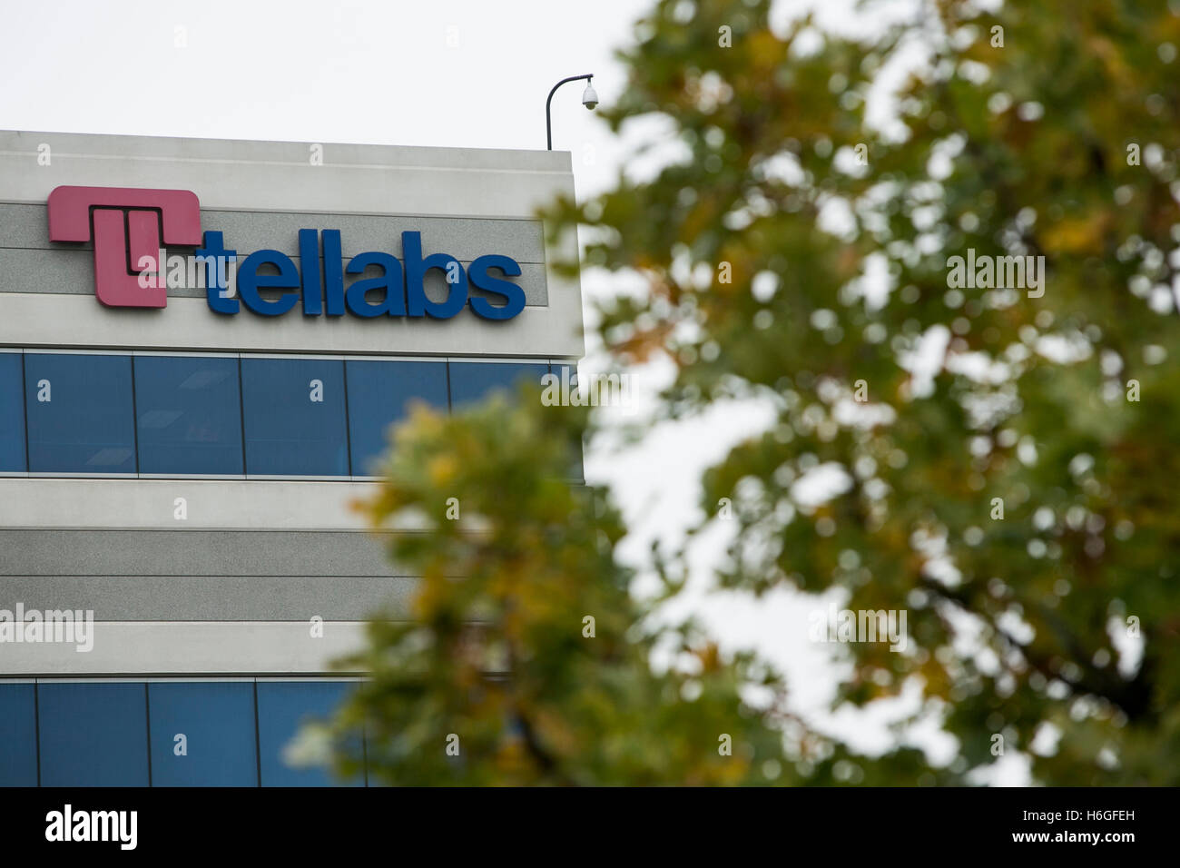 A logo sign outside of the headquarters of Tellabs, Inc., in Naperville ...