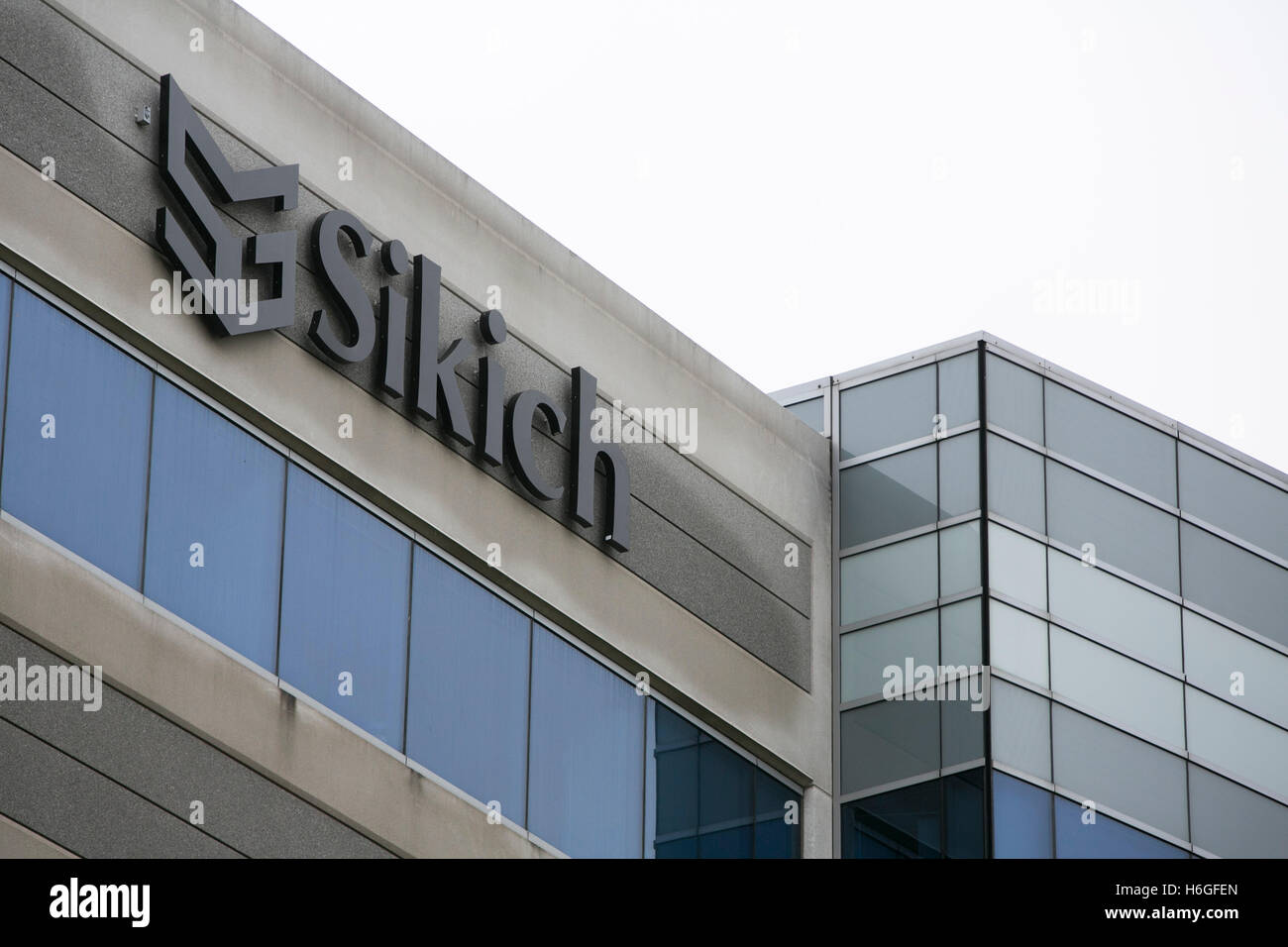 A logo sign outside of the headquarters of Sikich, LLP, in Naperville ...